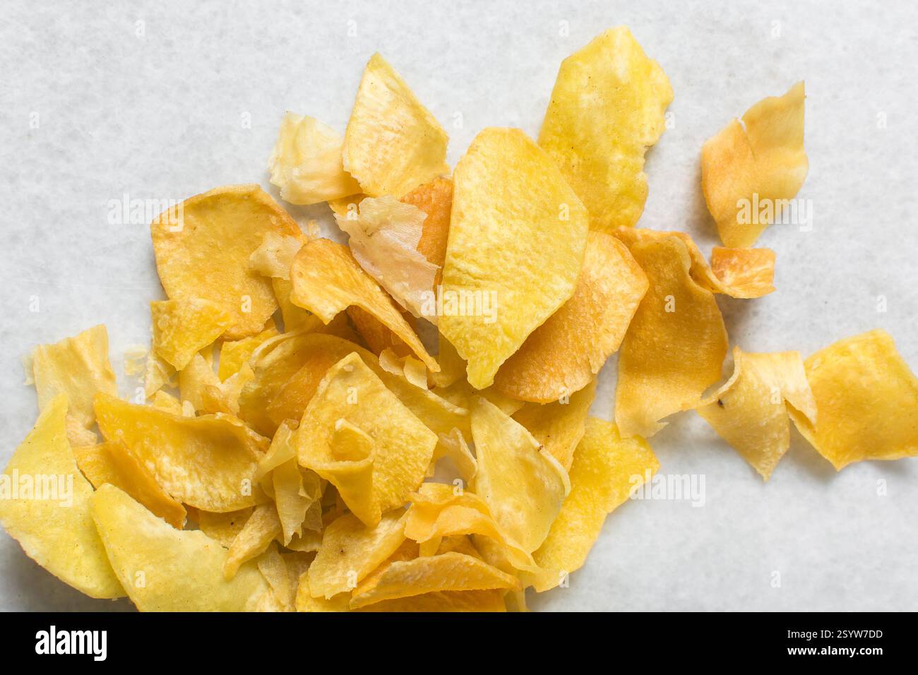 Overhead view of golden sweet potato chips, top view of crispy fried ...