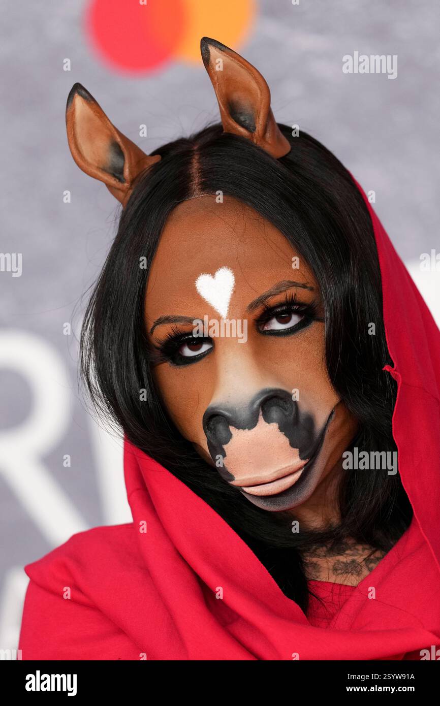 HorsegiirL poses for photographers upon arrival at the Brit Awards 2025 in London, Saturday ...
