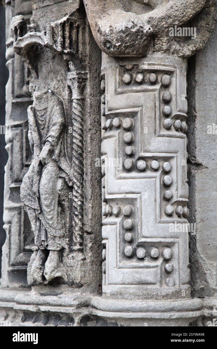Detailed stone columns showcase intricate carvings at Notre-Dame de ...