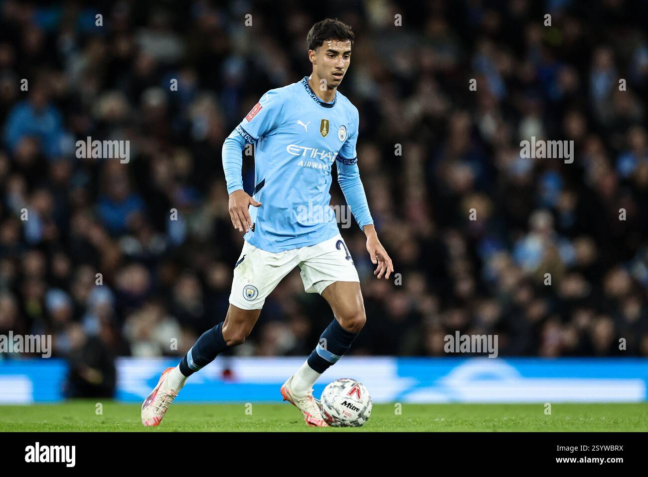 Manchester, UK. 01st Mar, 2025. Vitor Reis of Manchester City with the ...
