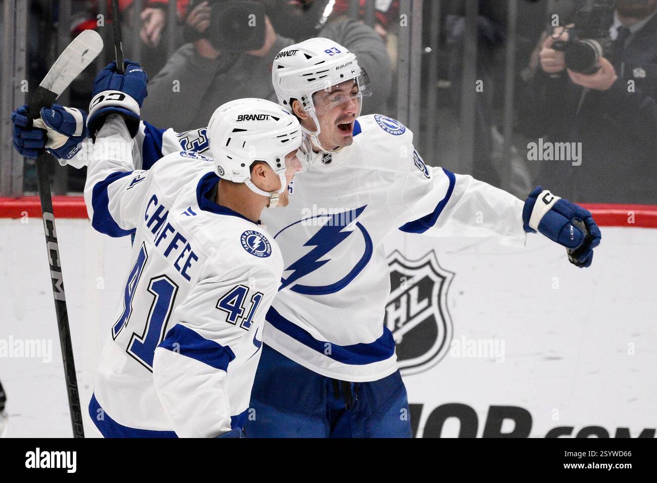 Tampa Bay Lightning center Gage Goncalves, right, celebrates his goal ...
