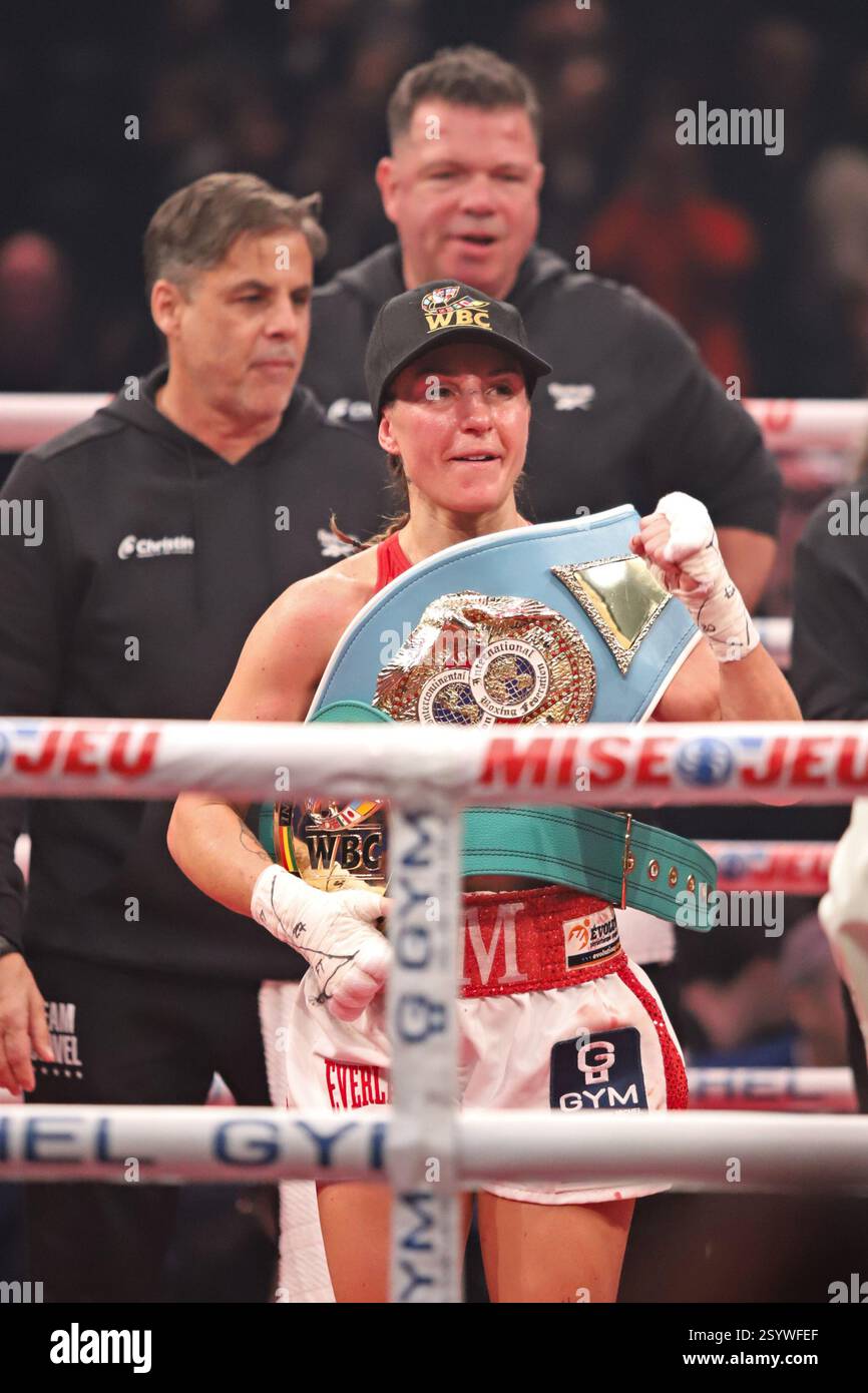 Kim Clavel celebrates the victory against Anabel Ortiz after the boxing ...