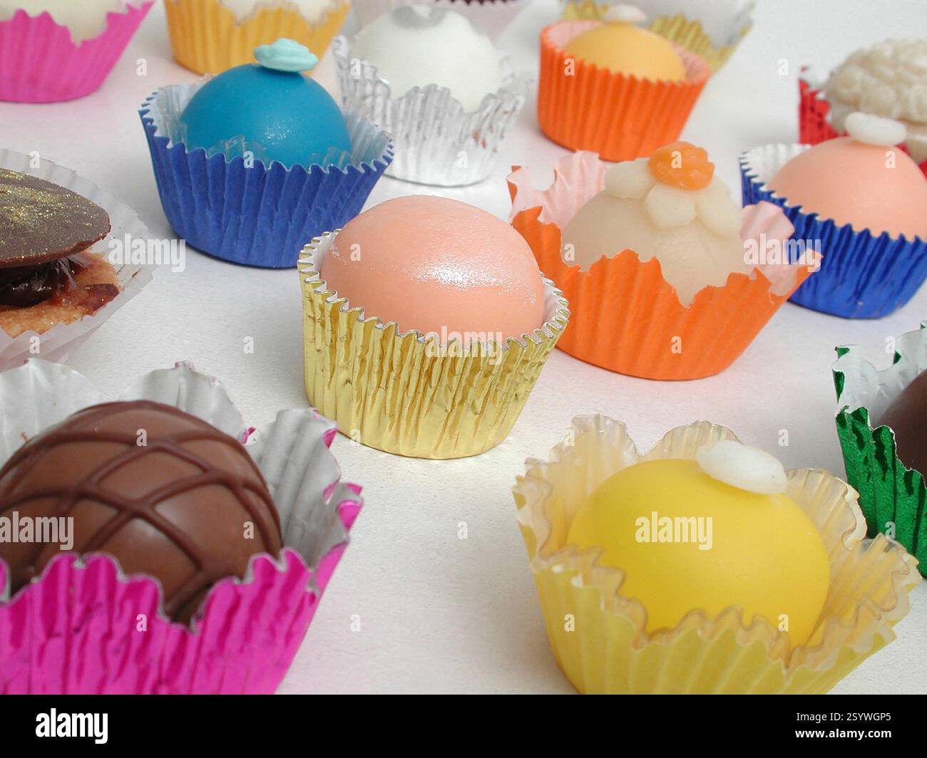top view of candy and delicacy to birthday party on white background ...