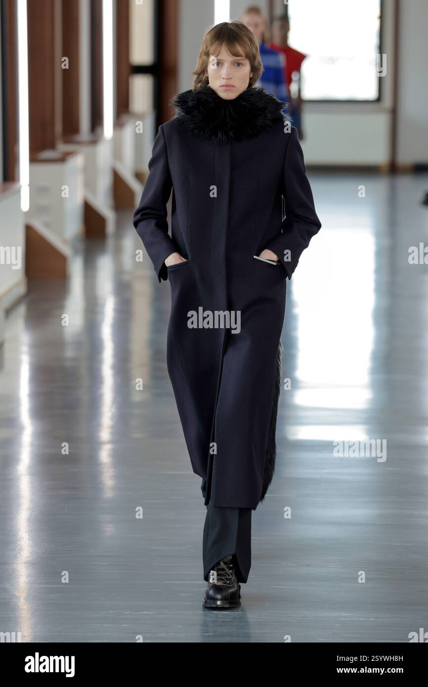 Milan, Italy. 01st Mar, 2025. A model walks on the runway during the ...