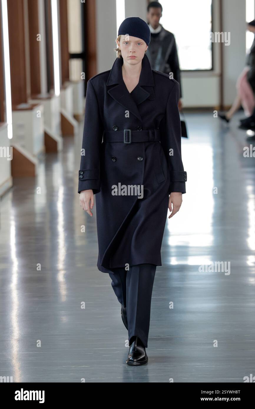 Milan, Italy. 01st Mar, 2025. A model walks on the runway during the ...