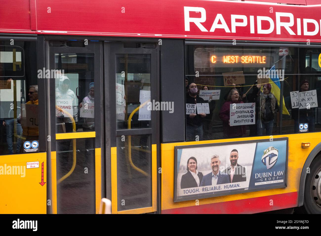 Seattle, USA. 1st Mar 2025. Activists gather at the South Lake Union ...