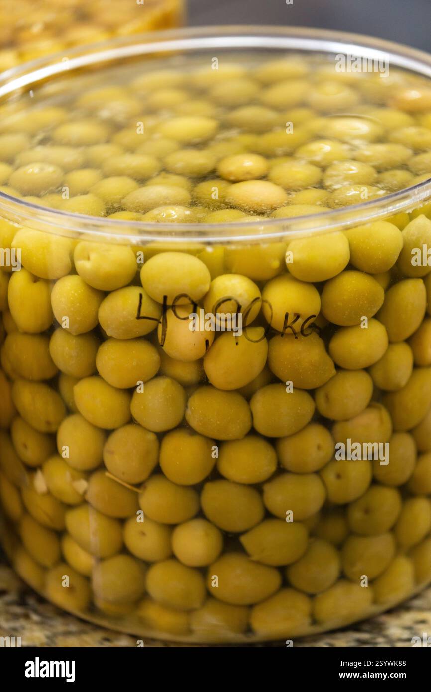 preserved olives on display at a street market stall in Sao Paulo ...