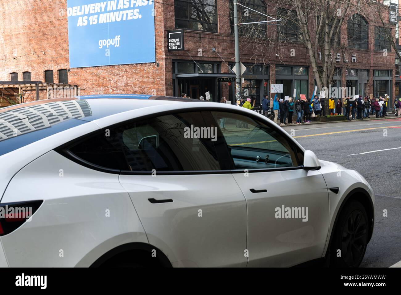 Seattle, USA. 1st Mar 2025. Activists gather at the South Lake Union ...