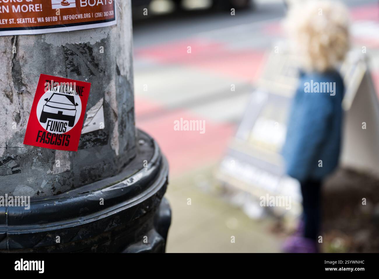 Seattle, USA. 1st Mar 2025. Activists gather at the South Lake Union ...
