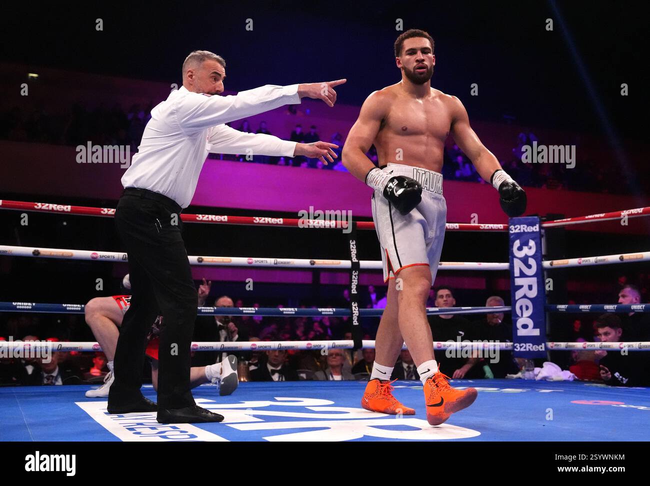 The ringside referee stops the fight after Karol Itauma (right) knocks ...