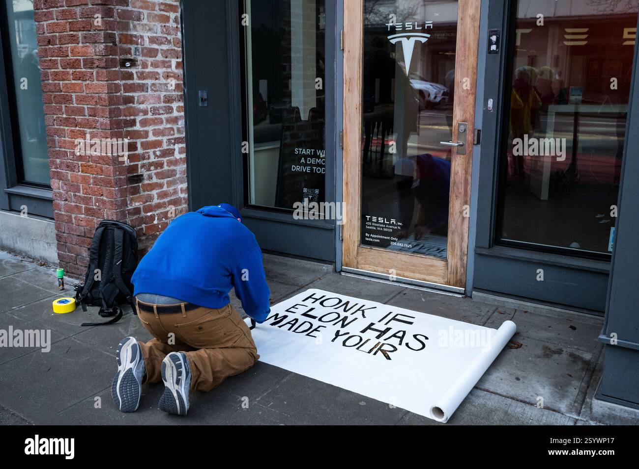 Seattle, USA. 1st Mar 2025. Activists gather at the South Lake Union ...