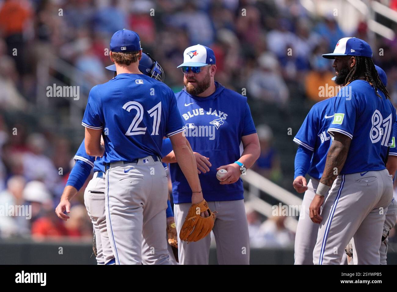 Toronto Blue Jays manager John Schneider pulls pitcher Josh Walker (21 ...