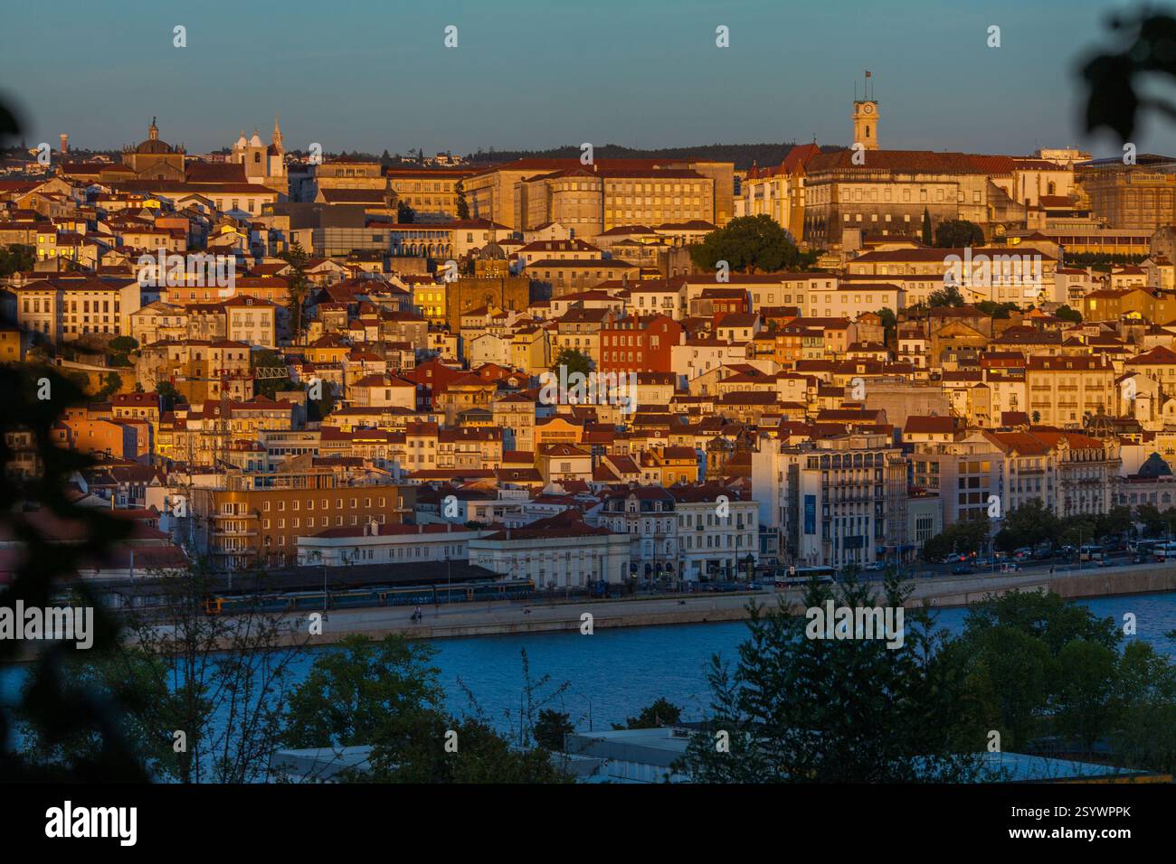 A sprawling cityscape with diverse architecture, featuring prominent ...