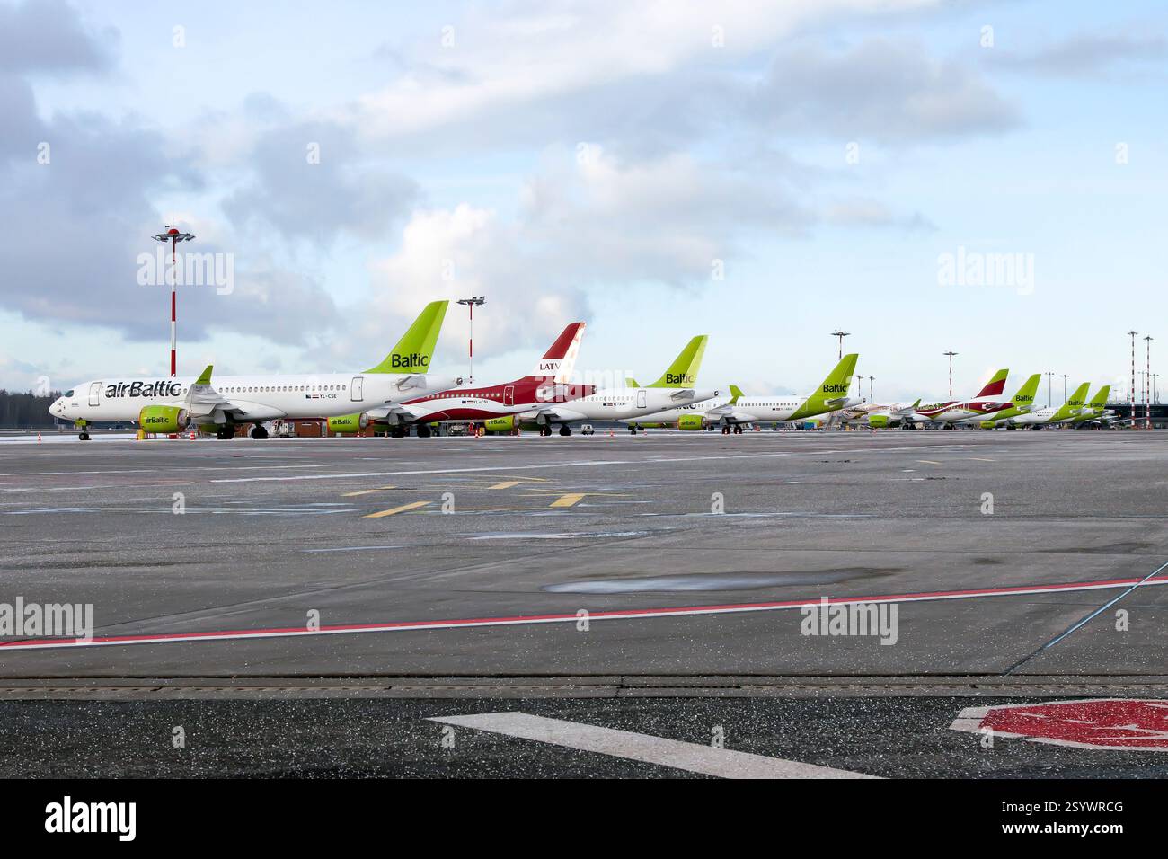 Full view of a Ramp of Riga International Airport with a row of Air ...