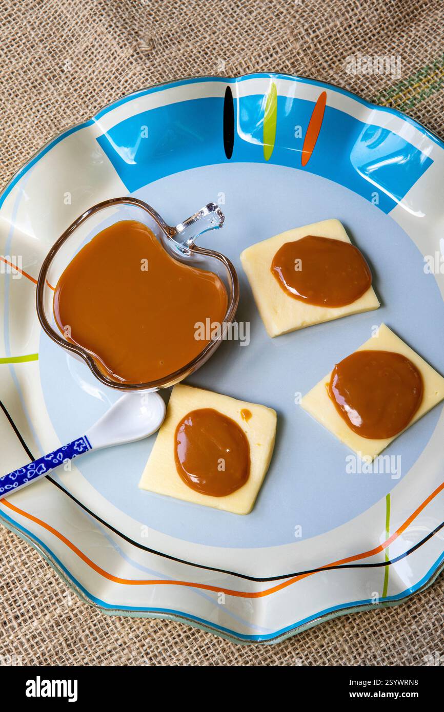Traditional brazilian dessert with melted caramel and cheese. Called ...
