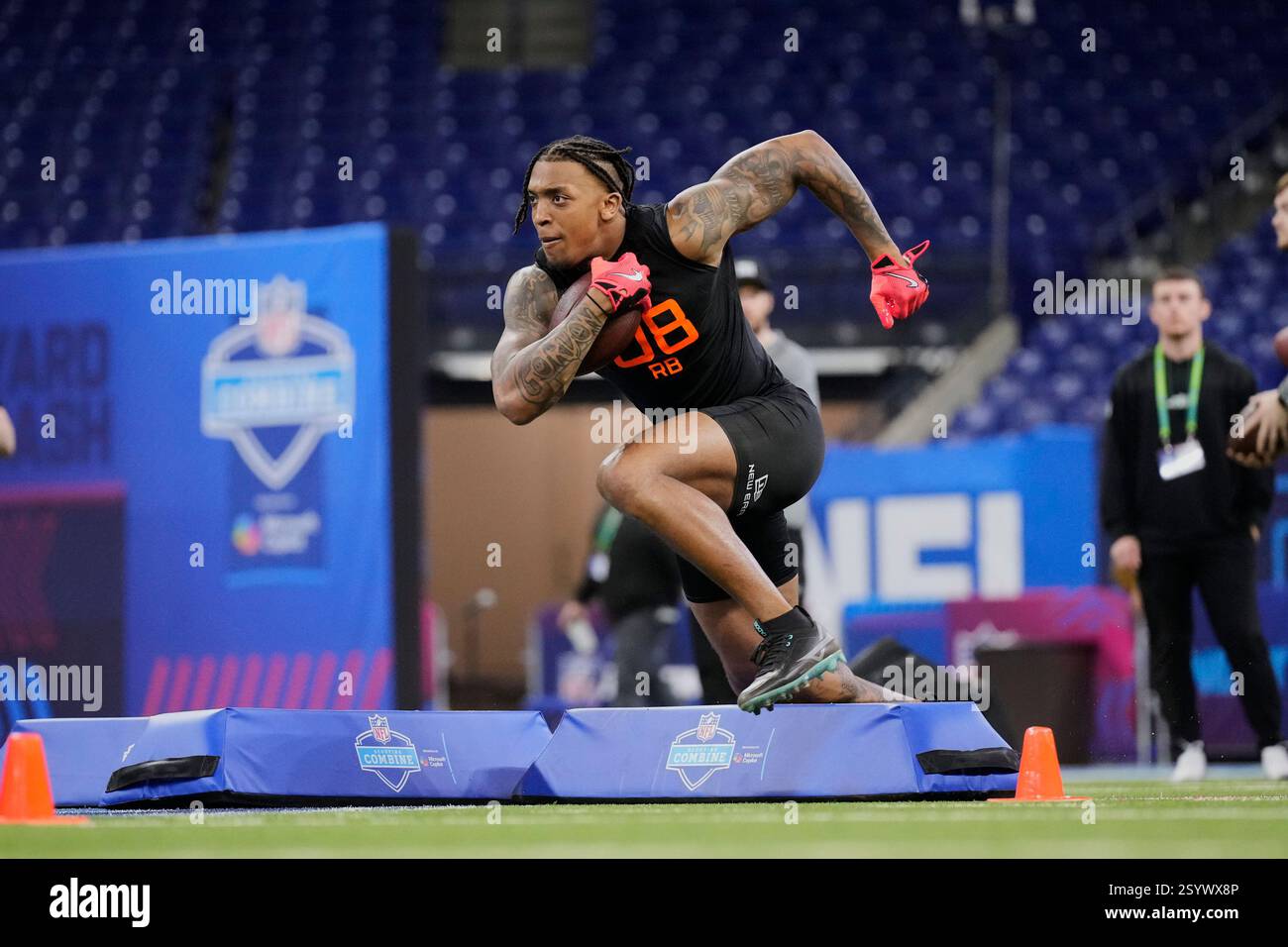 Oklahoma State running back Ollie Gordon II runs a drill at the NFL ...