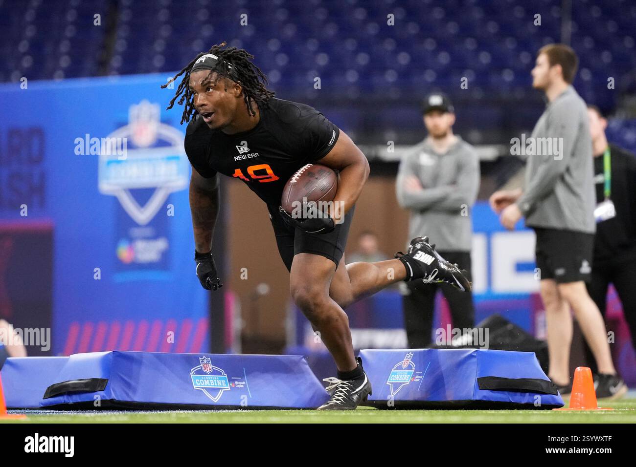 Cincinnati running back Corey Kiner runs a drill at the NFL football ...