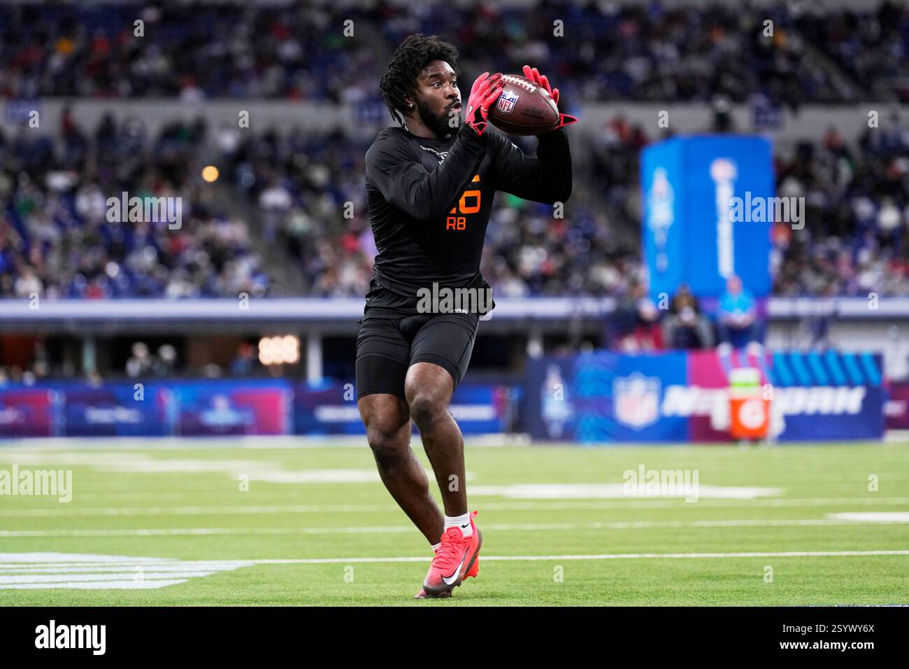 Tennessee running back Dylan Sampson runs a drill at the NFL football ...