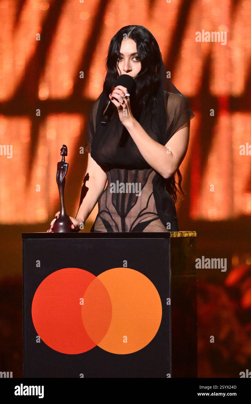 London, UK. 1 March 2025. Charlie XCX after winning the Song of the Year award at the BRIT ...