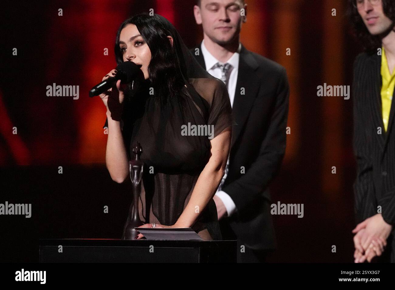 Charli xcx accepts the best dance act award during the Brit Awards 2025 ...