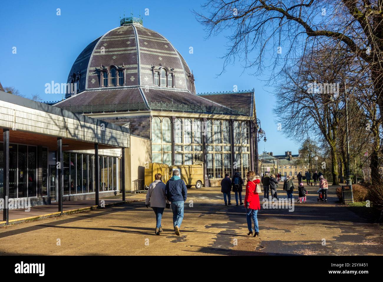 People walking past the victorian Pavilion Gardens in the Derbyshire ...