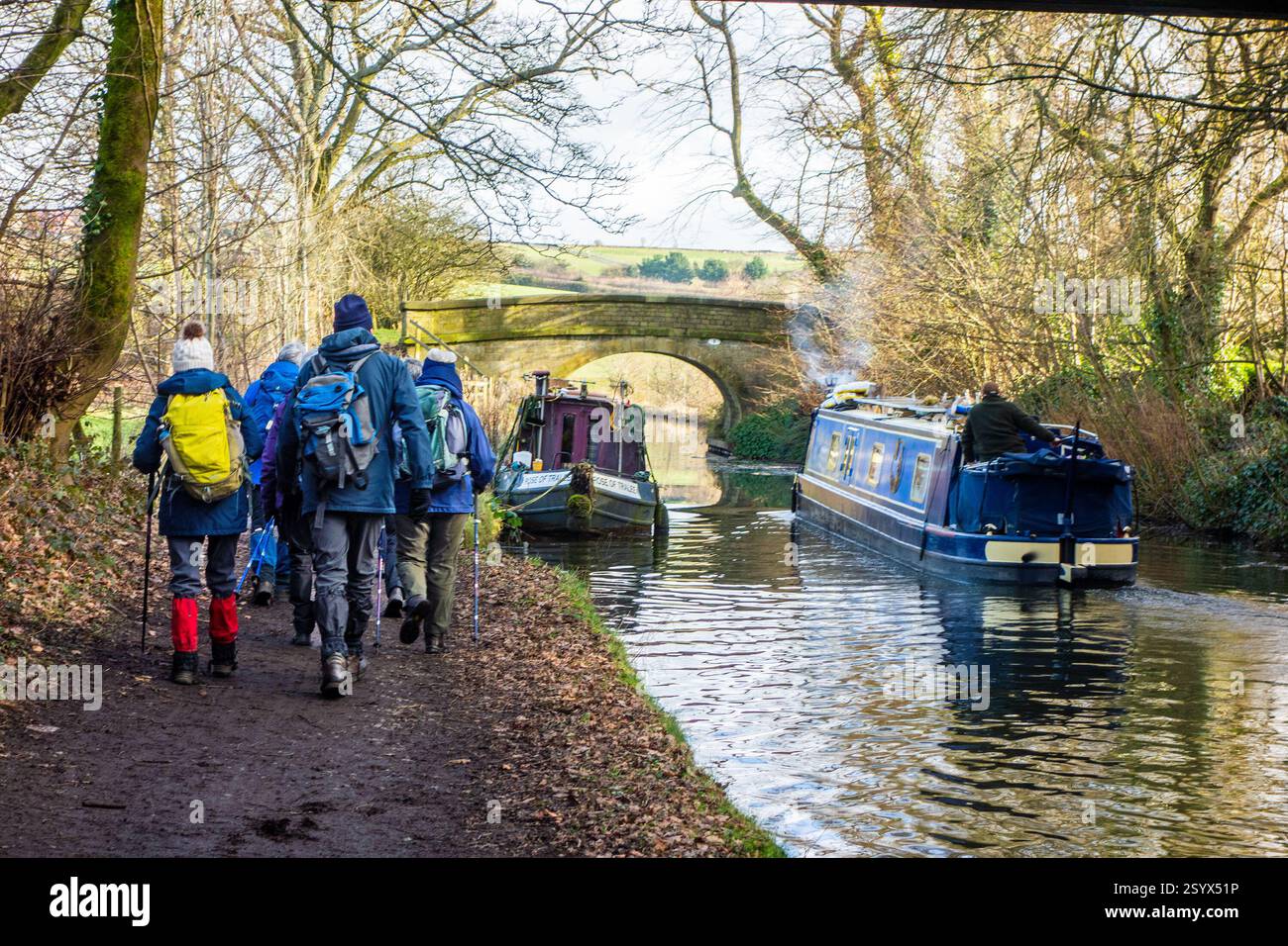 Walking group walking along the towpath of the Macclesfield canal ...