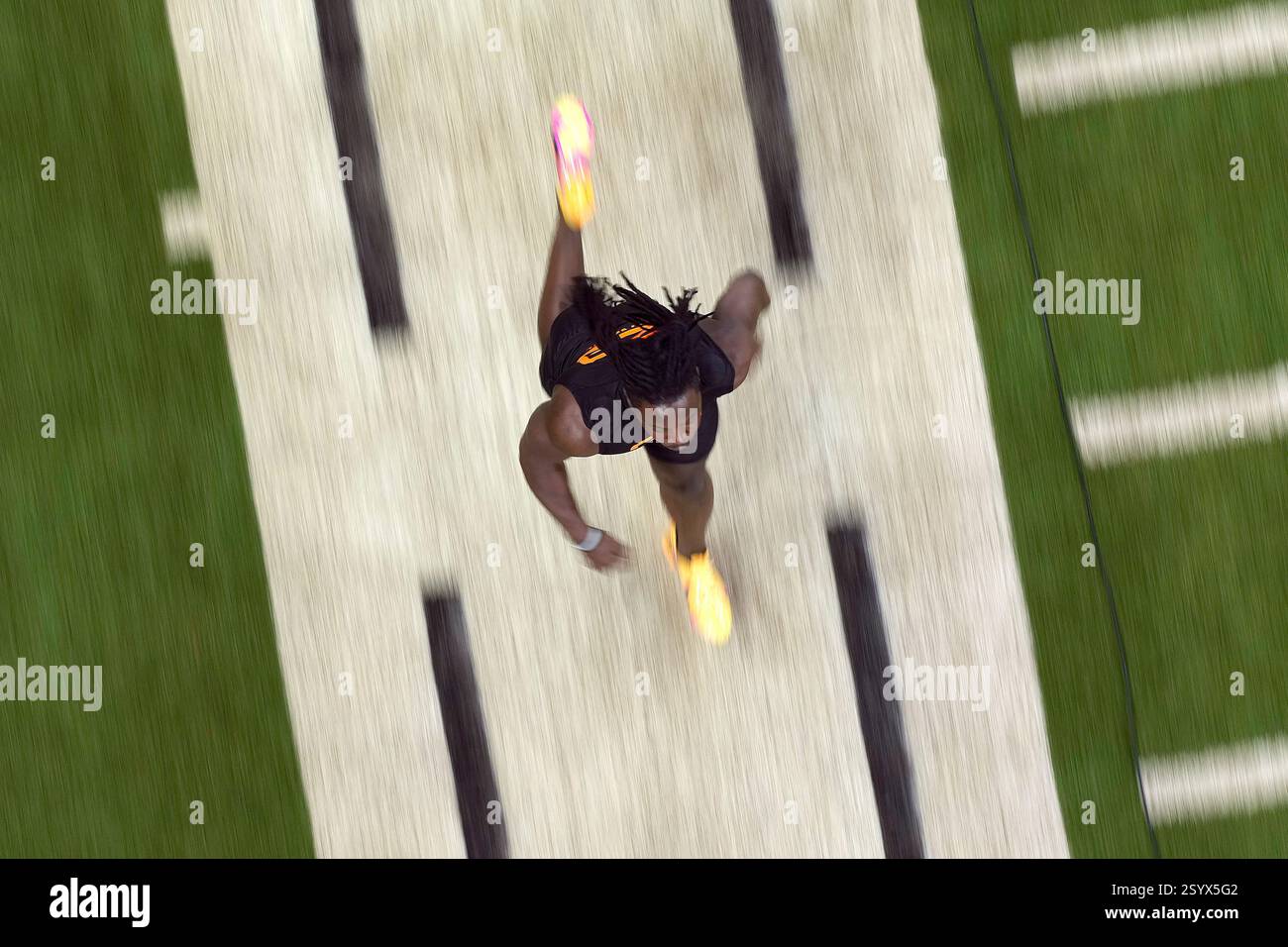 Rutgers running back Kyle Monangai runs in the 40-yard dash at the NFL ...