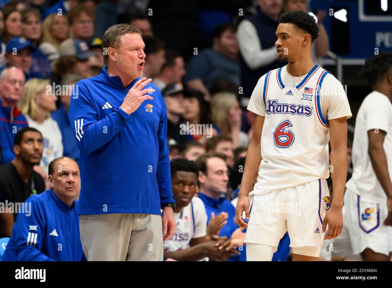 Kansas head coach Bill Self, left, talks to guard Rylan Griffen (6 ...