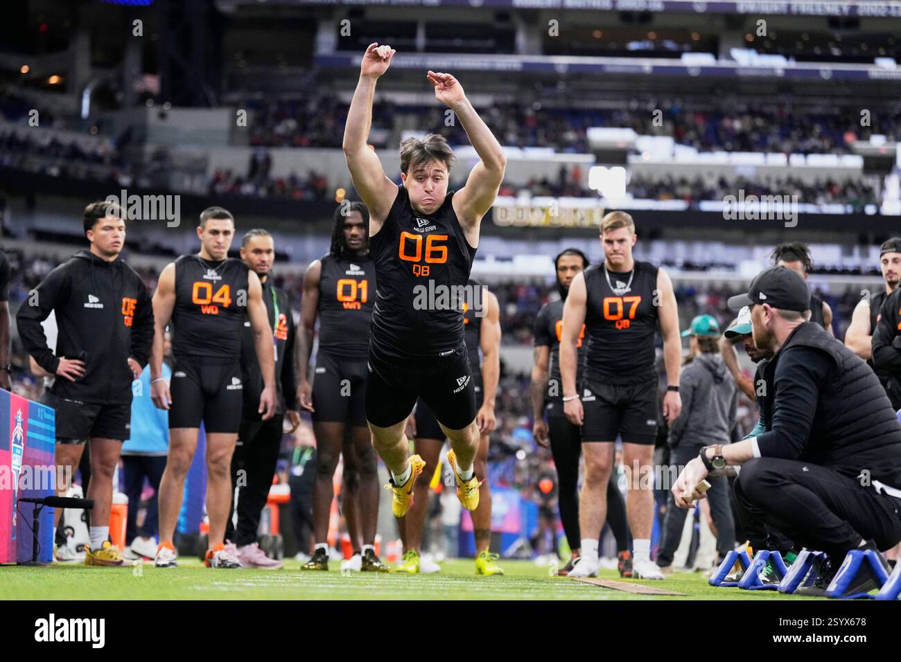 Kansas running back Devin Neal runs the 40-yard dash at the NFL ...