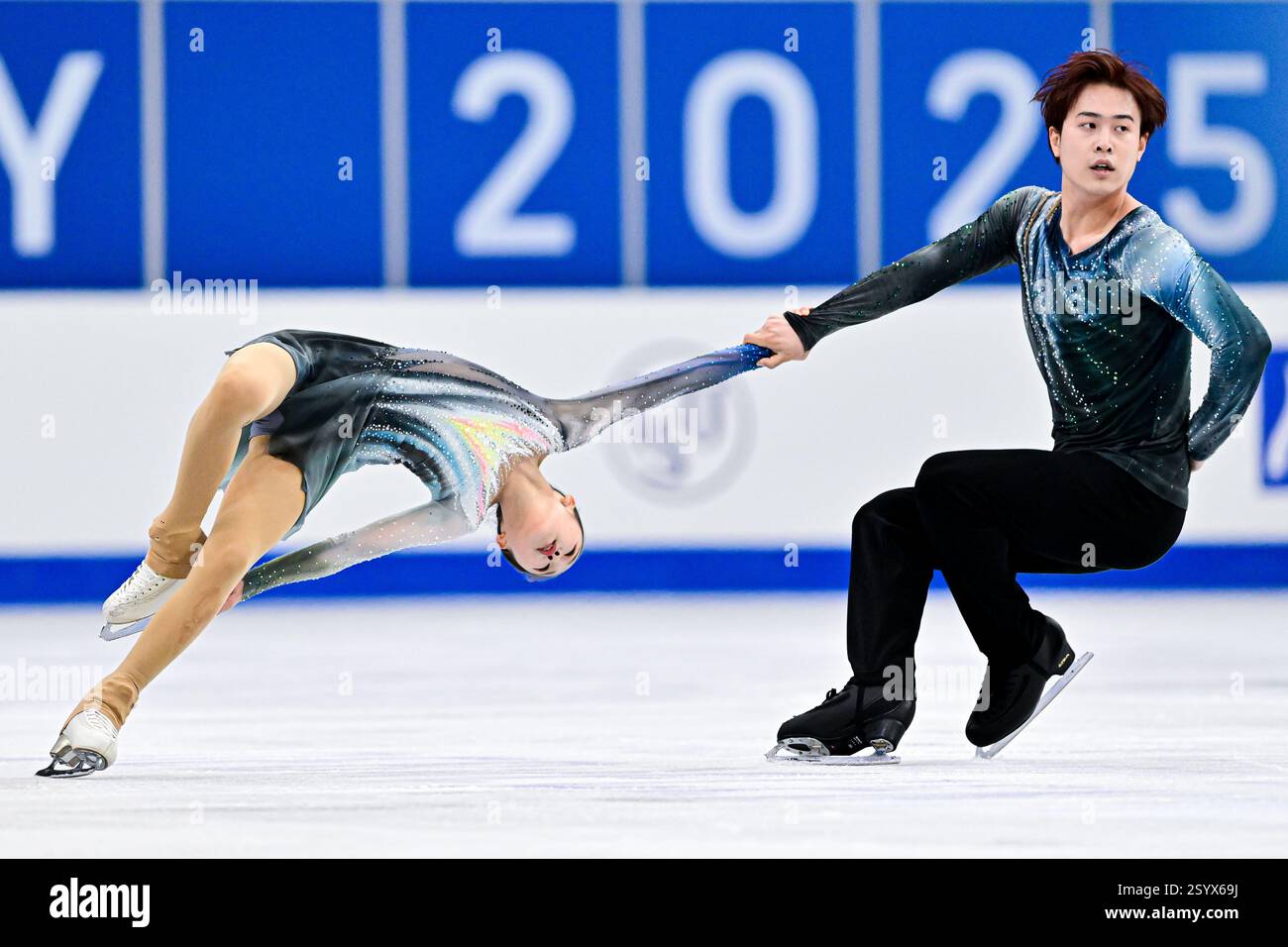 Jiaxuan ZHANG & Yihang HUANG (CHN), during Junior Pairs Free Skating ...