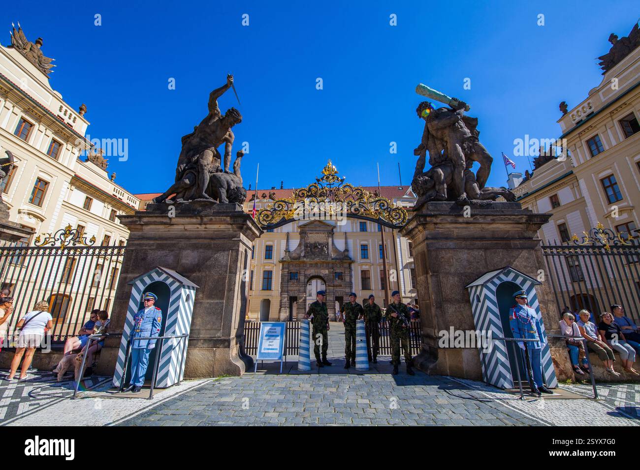 A panoramic view of a European cityscape with a historic castle complex ...