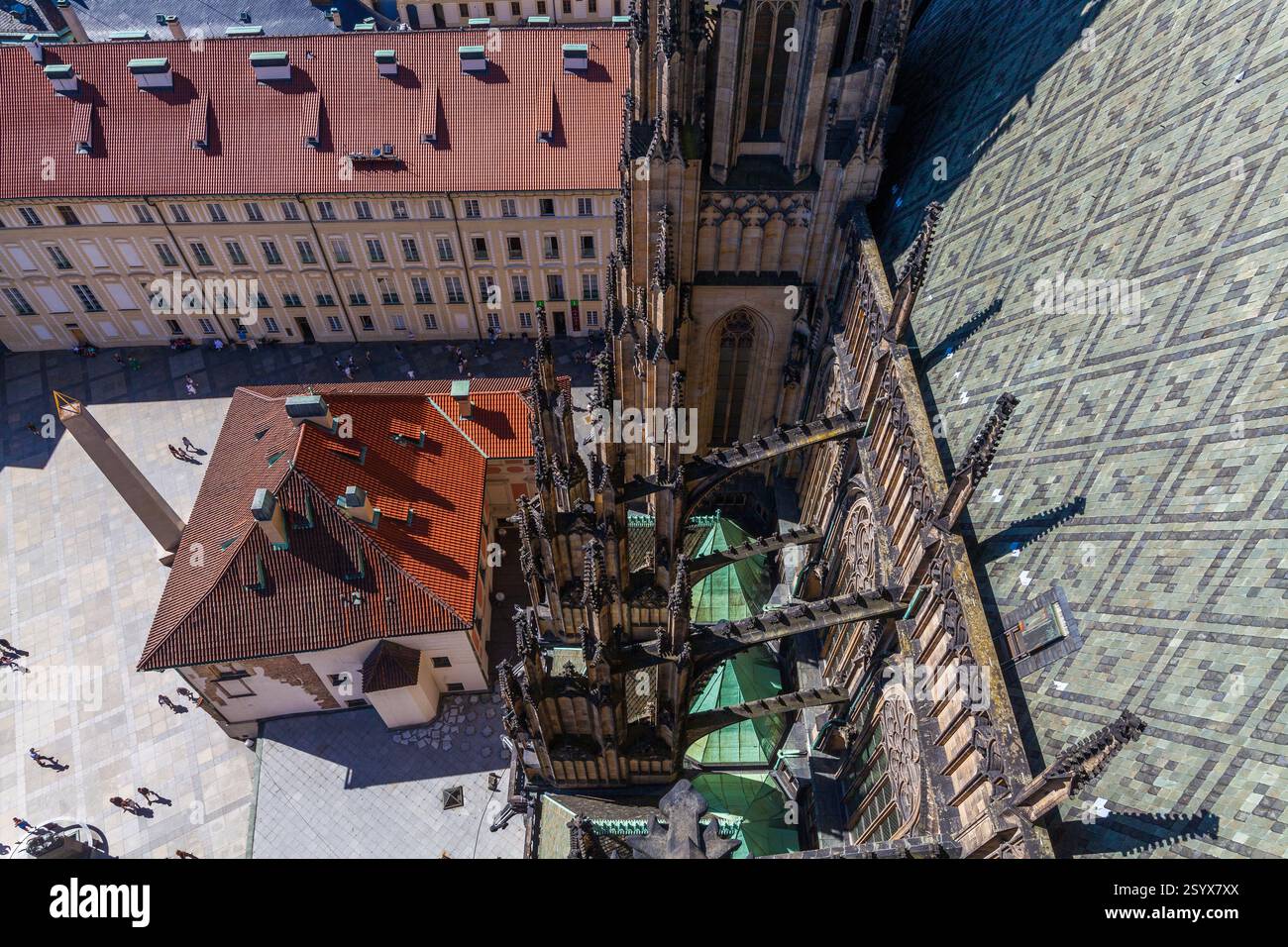 A striking aerial shot directly above a historic cathedral, showcasing ...