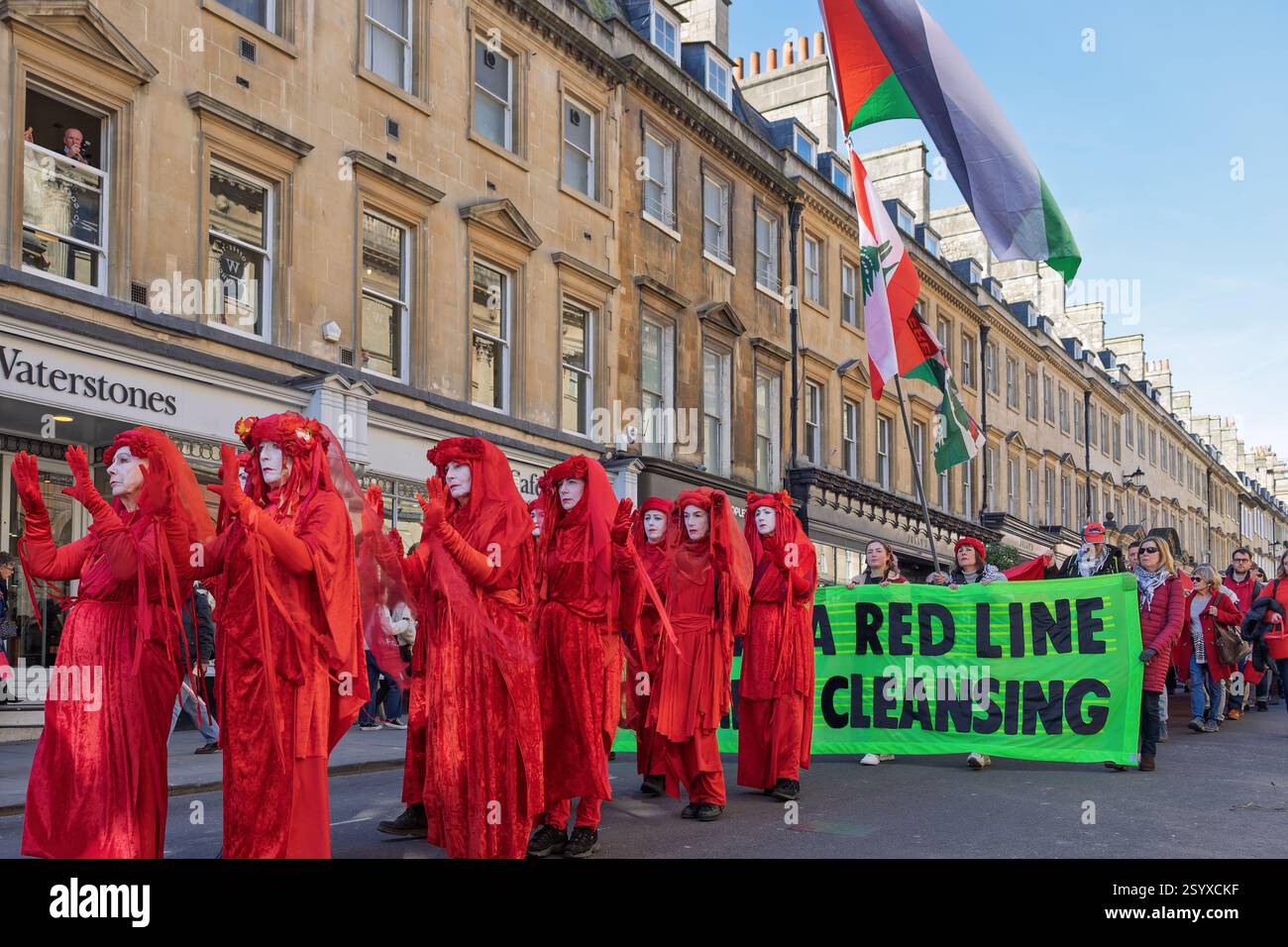 Bath, UK. 1st March, 2025. Dressed in their distinctive red rebel ...