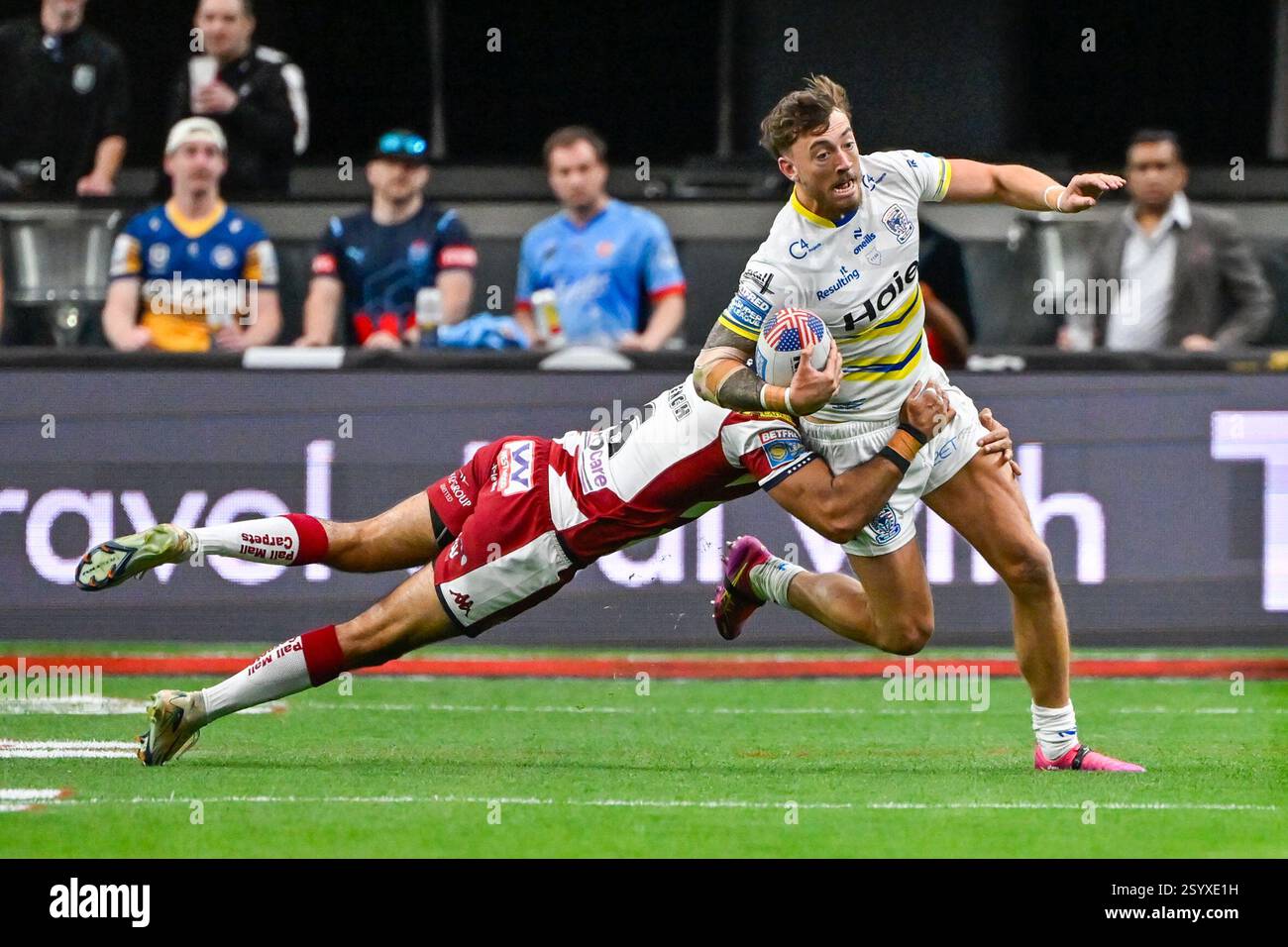 Warrington Wolves Toby King is tackled by a defender during the Super ...