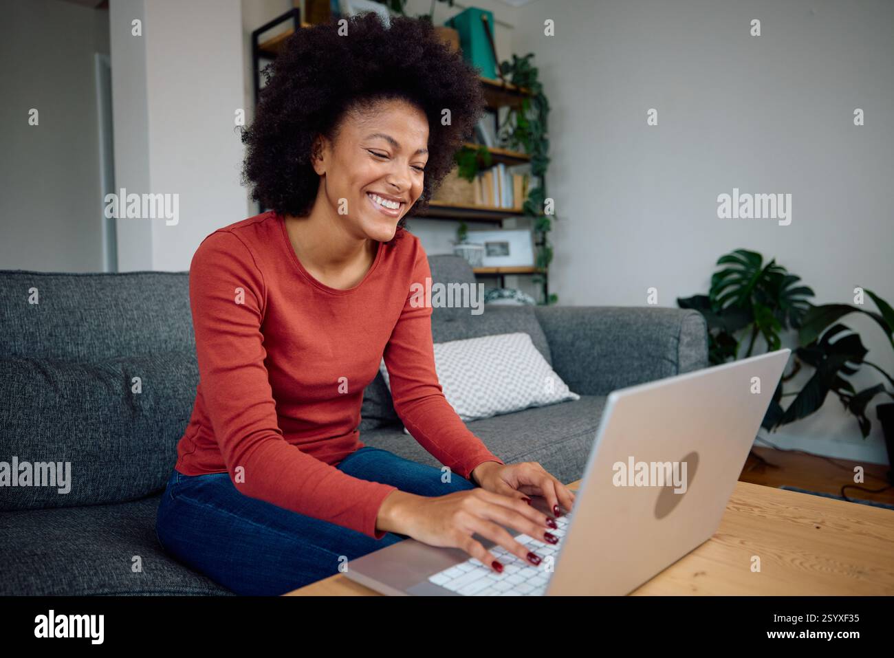 African american student typing essay hi-res stock photography and ...