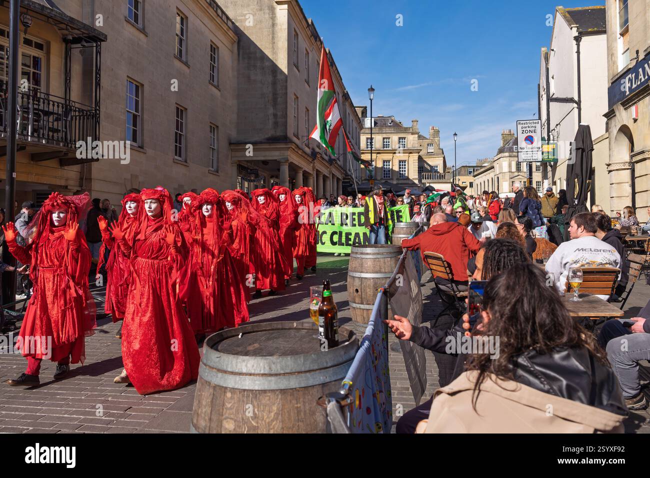 Bath, UK. 1st March, 2025. Dressed in their distinctive red rebel ...