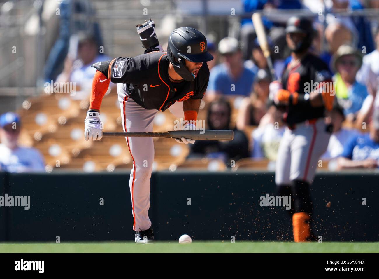 San Francisco Giants' Grant McCray reacts after being hit by a pitch ...