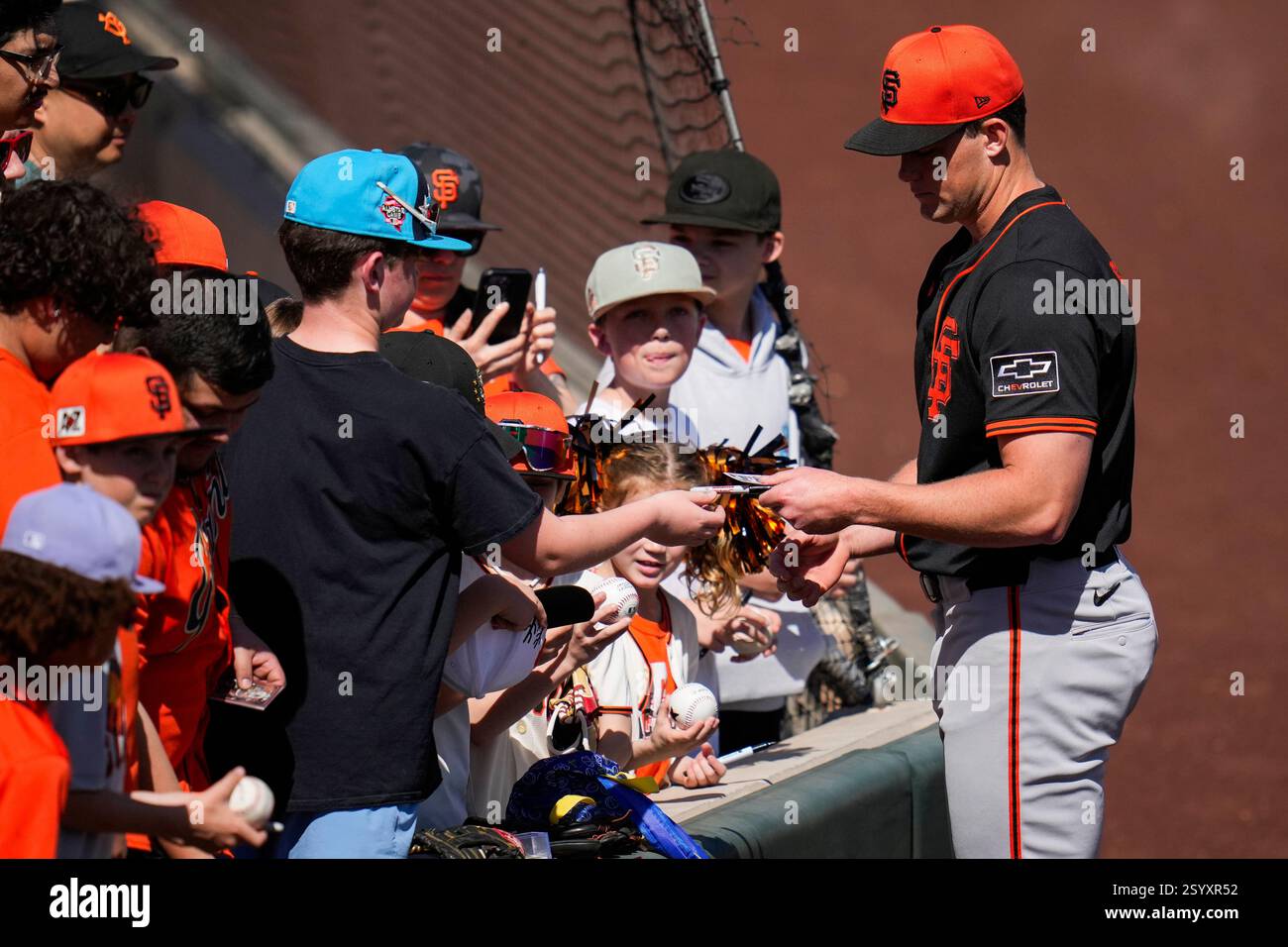 San Francisco Giants starting pitcher Carson Seymour signs autographs ...