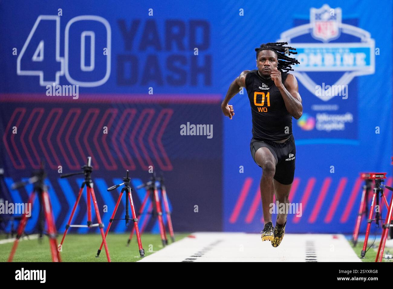 Arkansas wide receiver Andrew Armstrong runs the 40-yard dash at the ...
