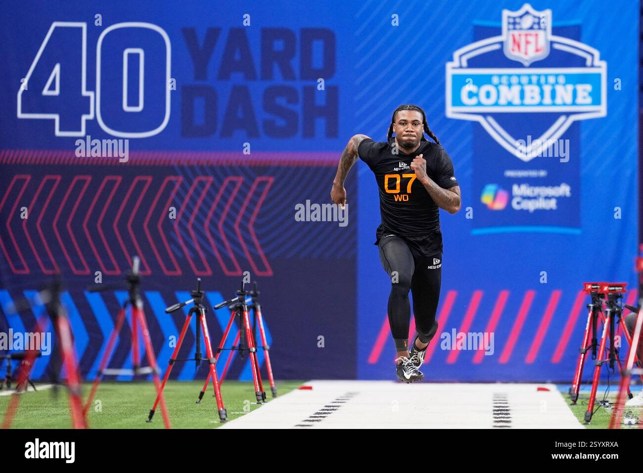 Miami wide receiver Sam Brown Jr. runs the 40-yard dash at the NFL ...