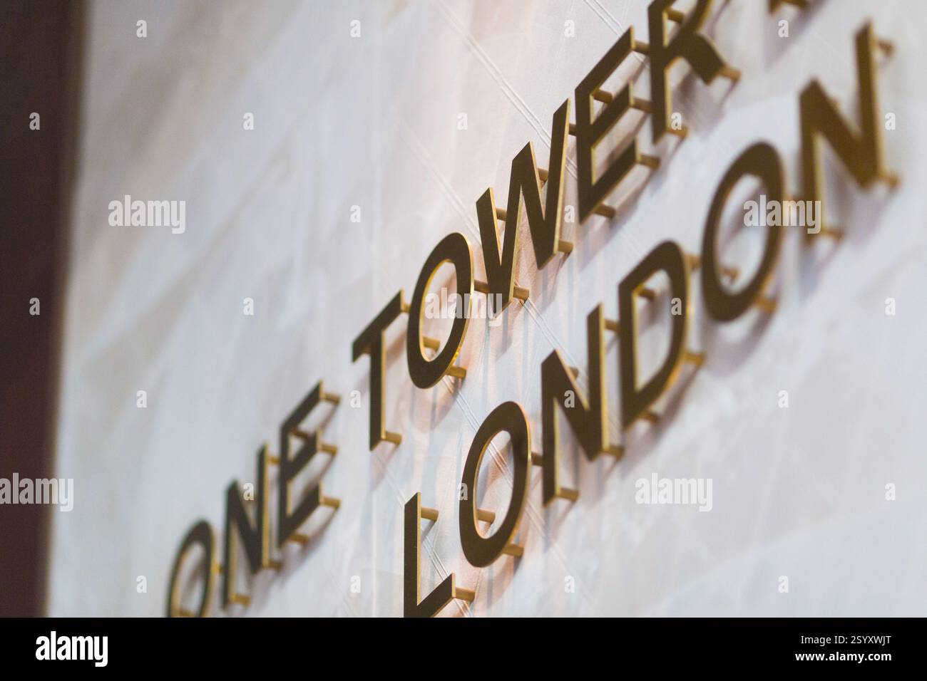 Gold-lettered sign for One Tower Bridge London Stock Photo - Alamy