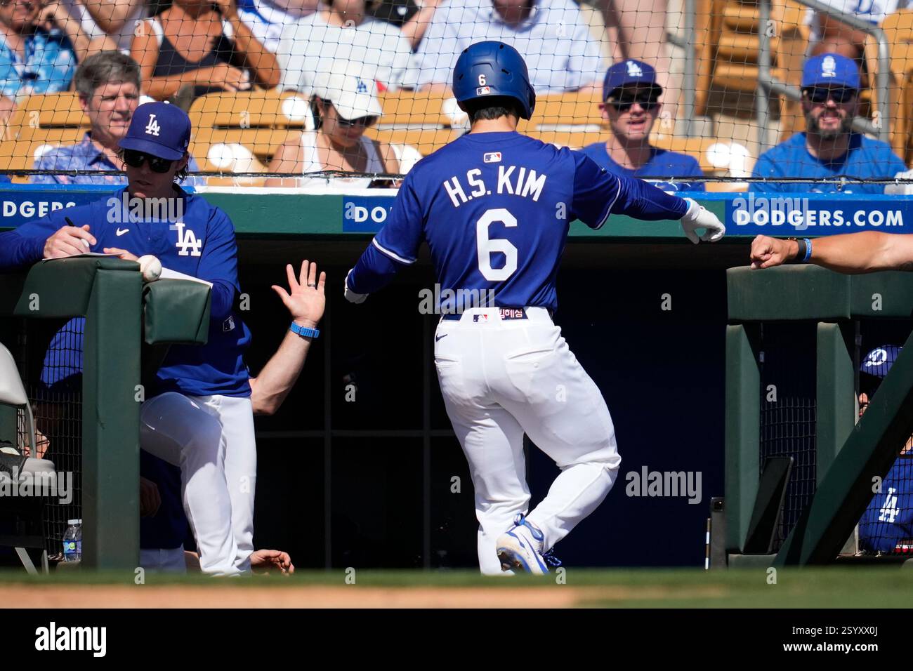 Los Angeles Dodgers' Hyeseong Kim (6) returns to the dugout after ...