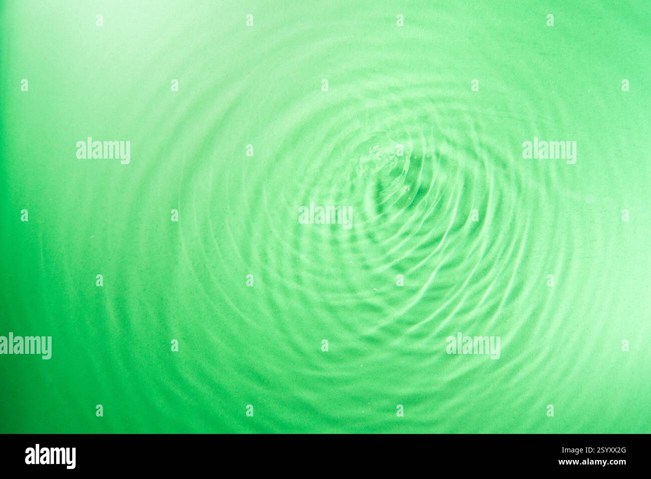 Background of water droplet waves expanding on the water surface ...