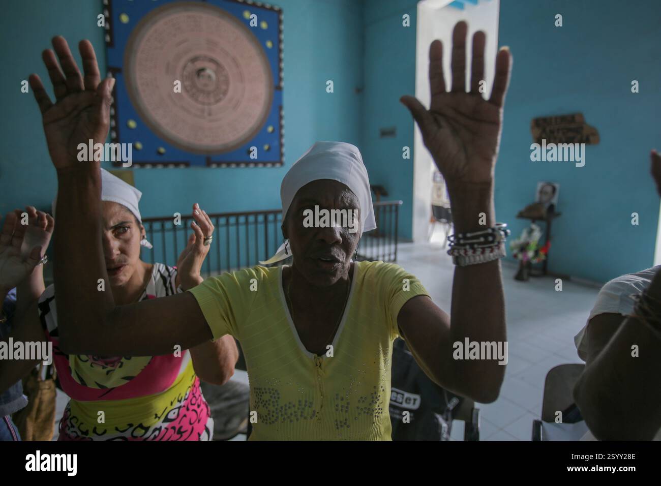Santeria believers and members of the Yoruba Cultural Association of ...