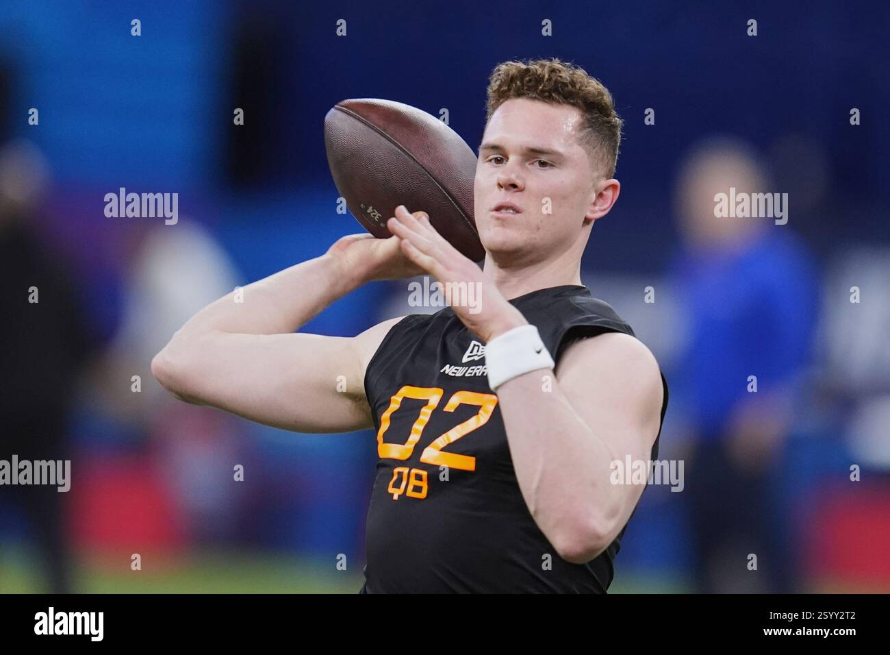 Missouri quarterback Brady Cook warms up at the NFL football scouting ...