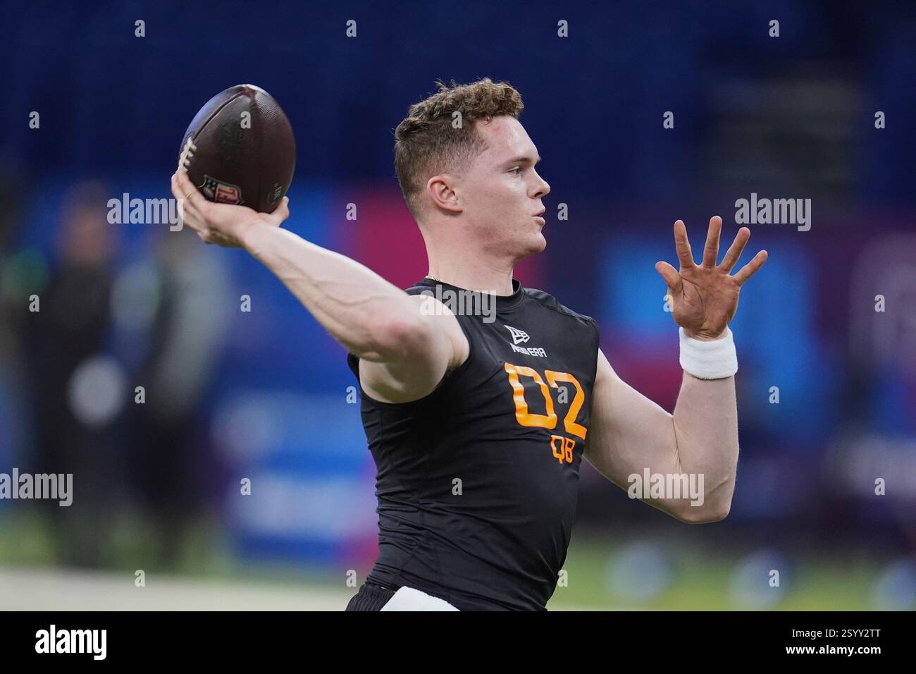 Missouri quarterback Brady Cook warms up at the NFL football scouting ...