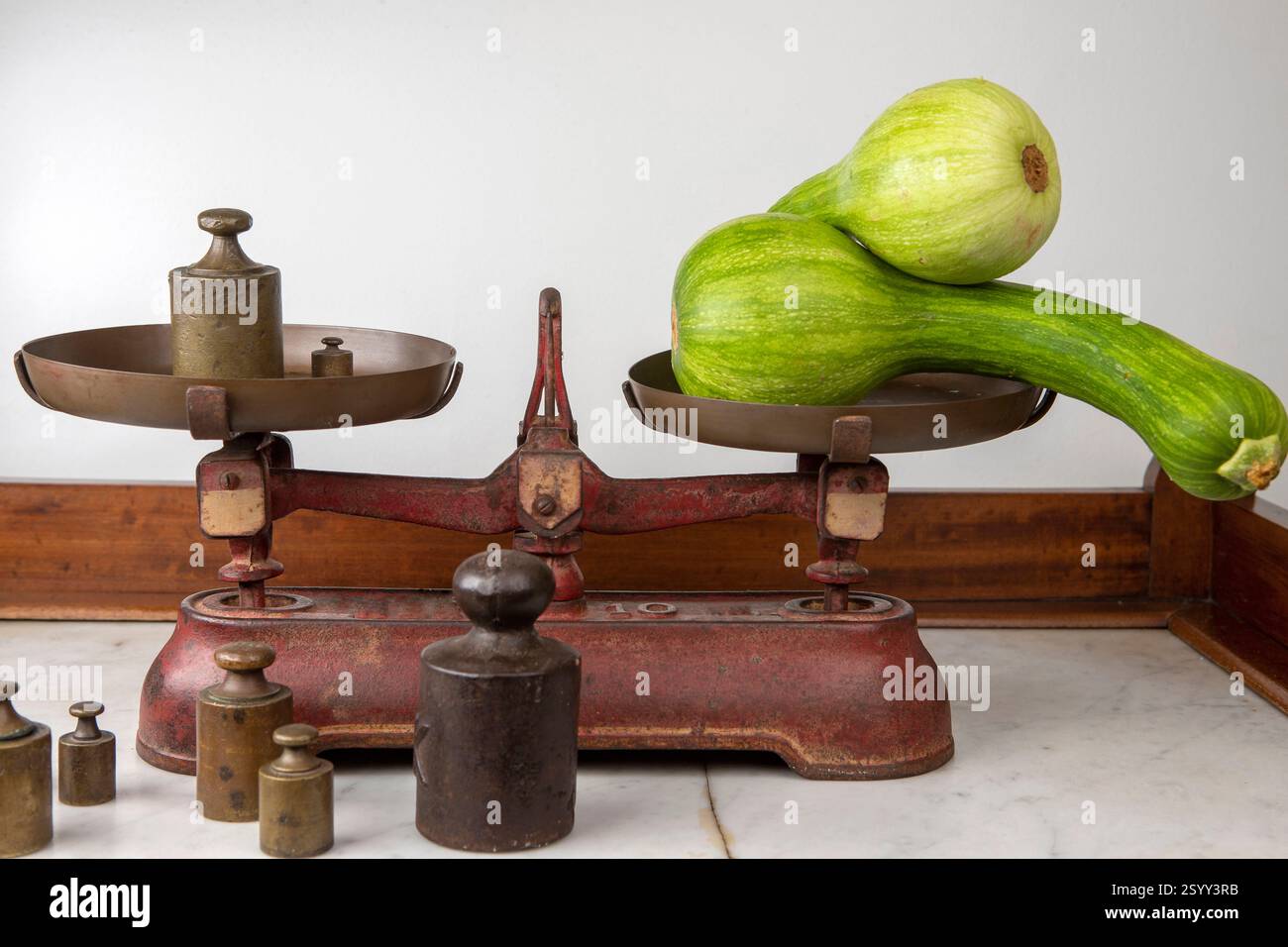 Vintage green weight balance hi-res stock photography and images - Alamy