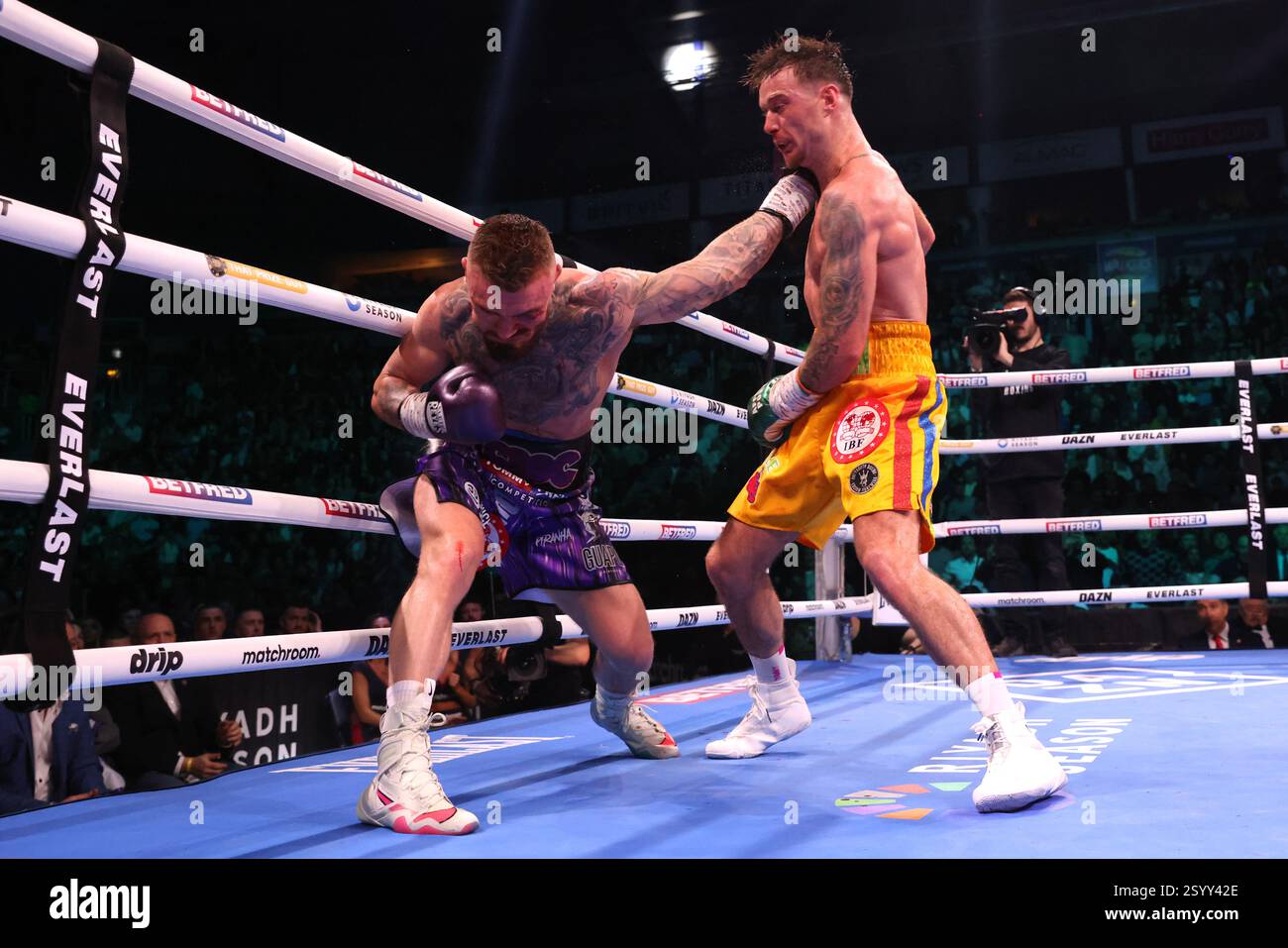 Paddy Donovan (right) in action against Lewis Crocker in the welterweight bout at the SSE Arena ...