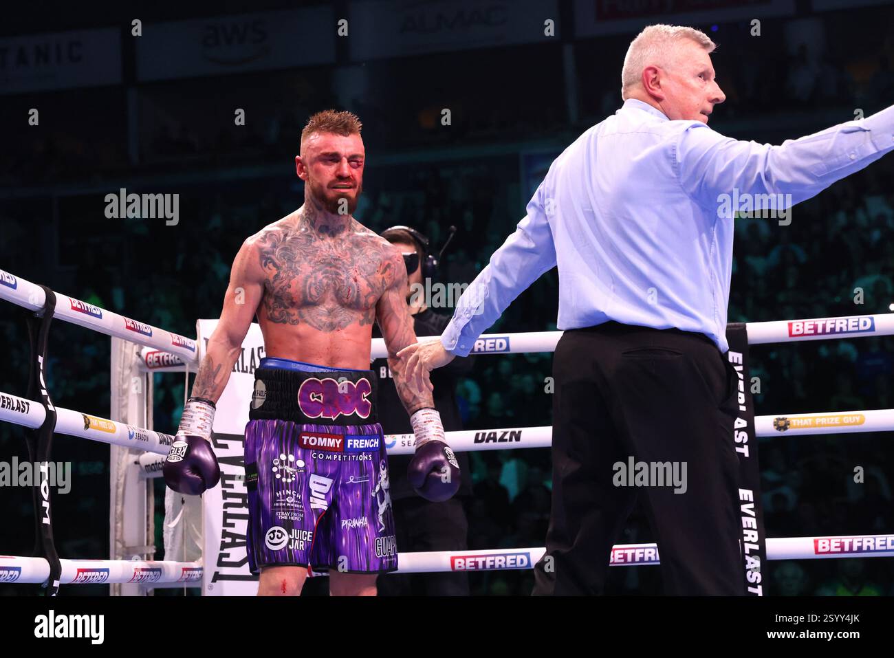 Lewis Crocker (left) reacts after being struck by Paddy Donovan (not ...