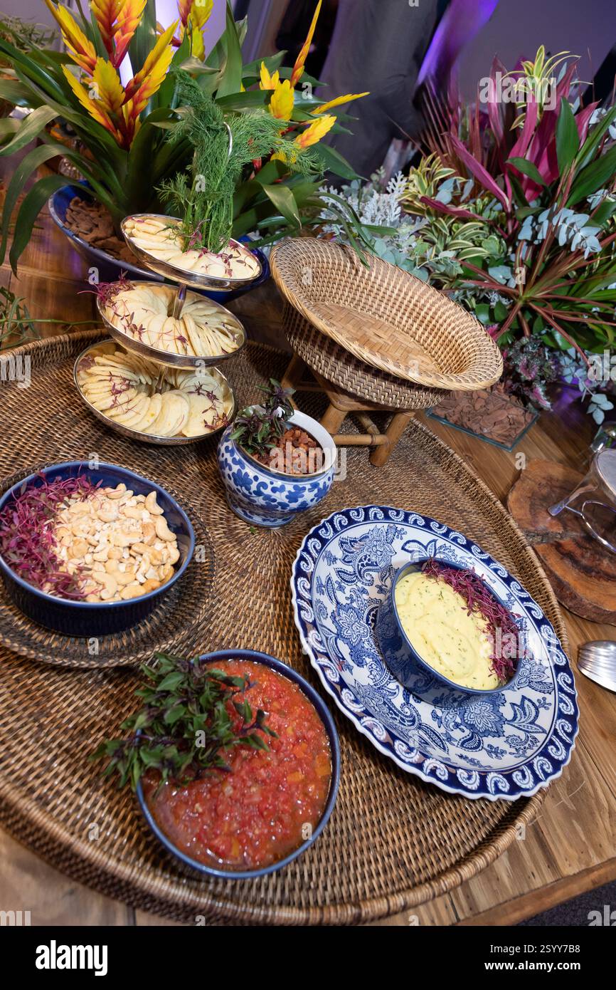 Sophisticated table of assorted brazilian foods Stock Photo - Alamy